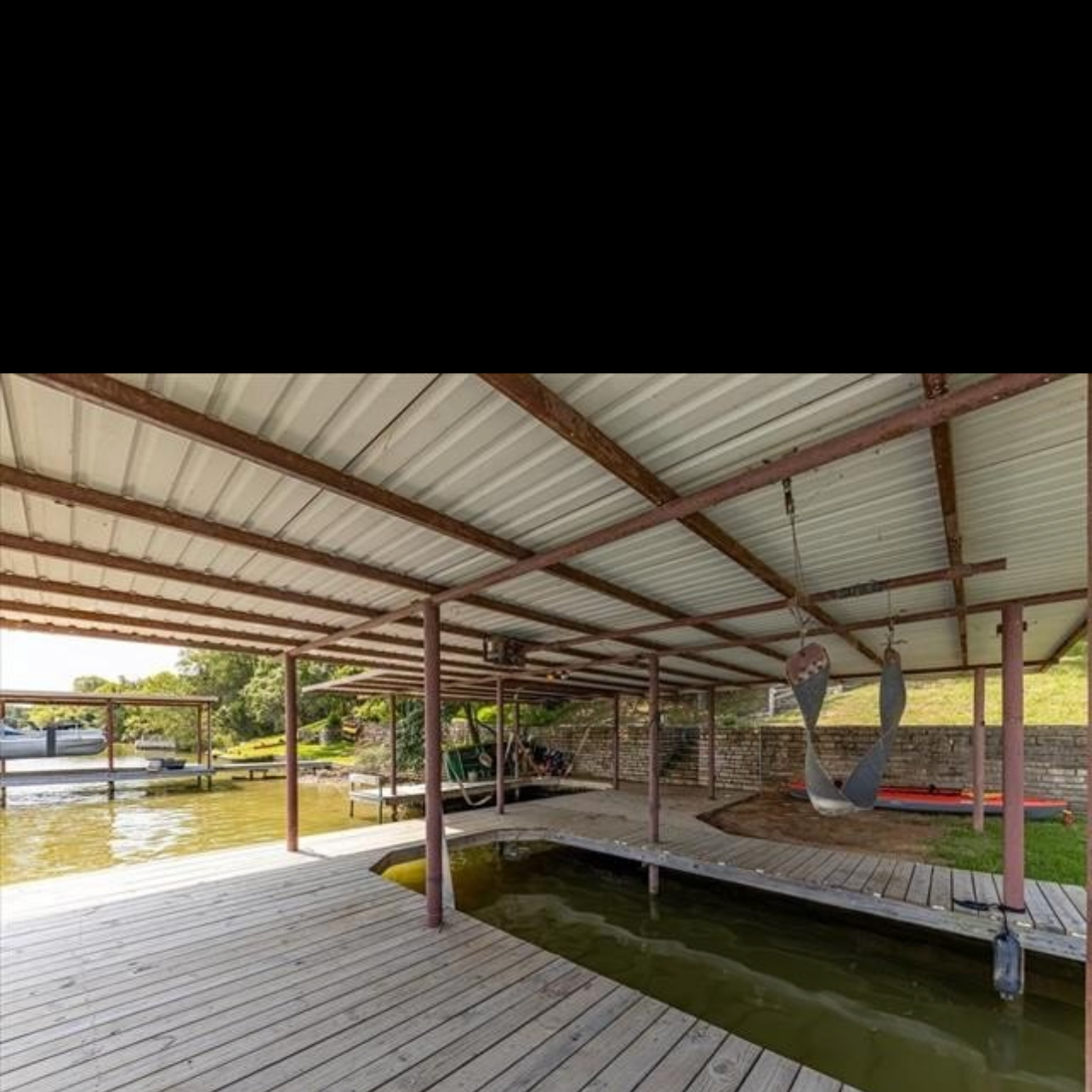 Private LAKEFRONT w/Double boat dock Camp Site Camping | The Dyrt